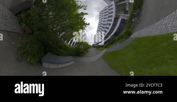 This is a 4 K UHD video of a walk through a beautiful courtyard ...