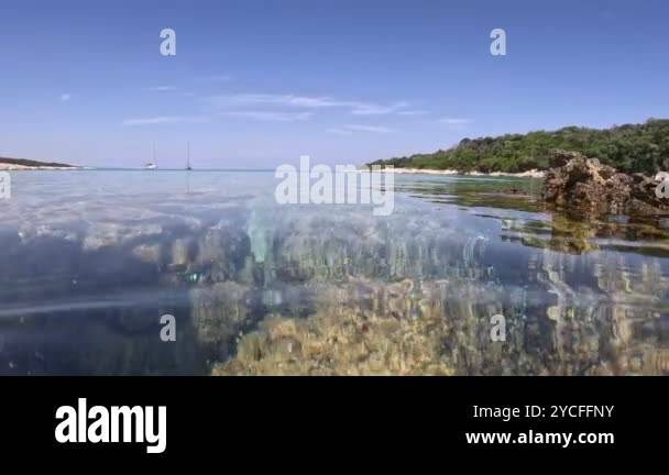 Camera dives into clear waters of Mediterranean Sea. Adriatic Sea ...