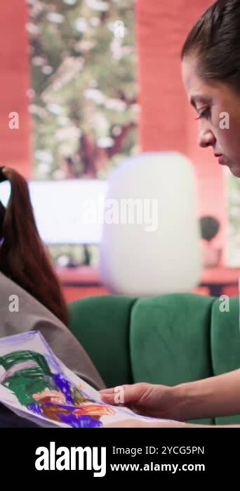 Therapist presenting unsettling dangerous drawings to mother, teen girl ...