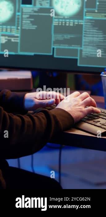 Vertical video Hacker hiding in underground bunker excited after developing zero day exploit ...