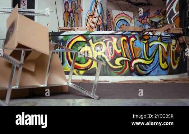 Empty vandalized property with graffiti paintings on walls, concept of ...