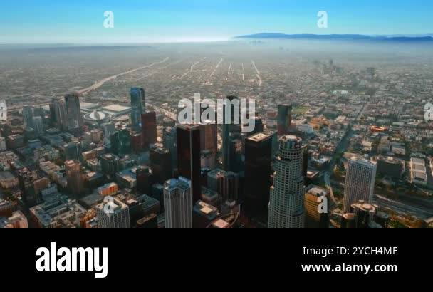 Slow descending above the midtown of vibrant Los Angeles, California ...