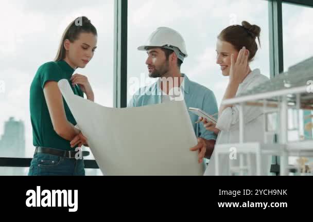 Professional architect engineer team talking, sharing, brainstorming ...