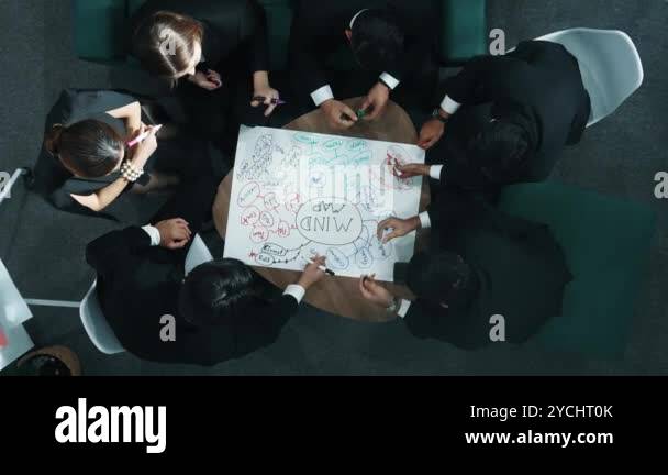 Top down aerial view of people putting hands together and clapping hands to celebrate successful ...