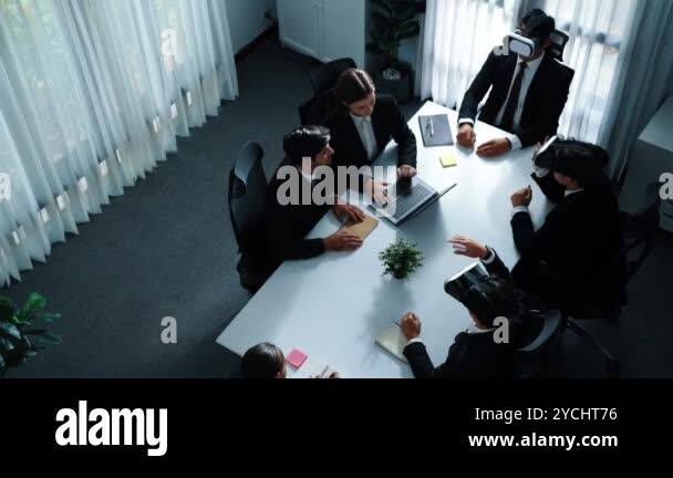Top view of manager working on laptop and sending data analysis to ...