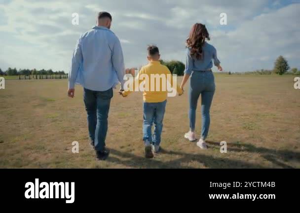 Back view man holding child hand Stock Videos & Footage - HD and 4K ...