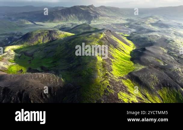 Beautiful black volcanic mountains covered by moss in the Icelandic ...
