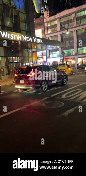 Experience NYCs vibrant nightlife where busy intersections buzz with ...
