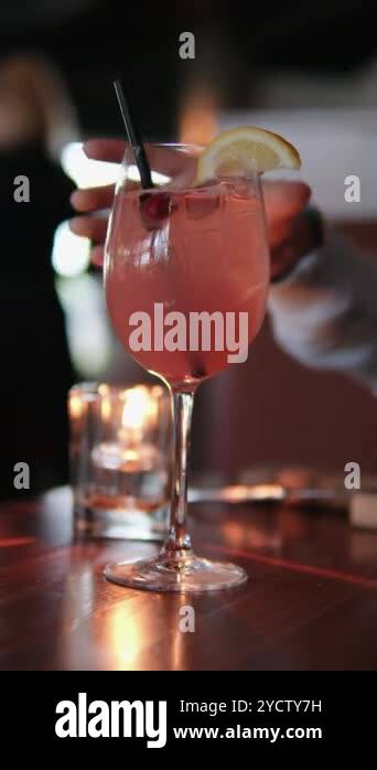 pizza and lemonade Close shot of food in restaurant. Hand takes piece ...