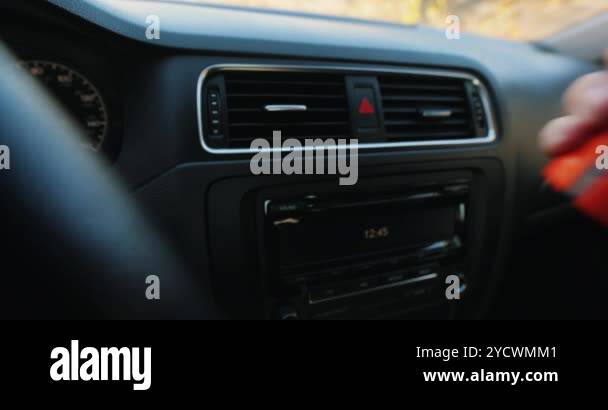 Measuring the temperature of hot air from the car deflector Stock Video ...