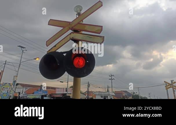 Brebes, 10 October 2024. Train marker lights at the railroad crossing ...