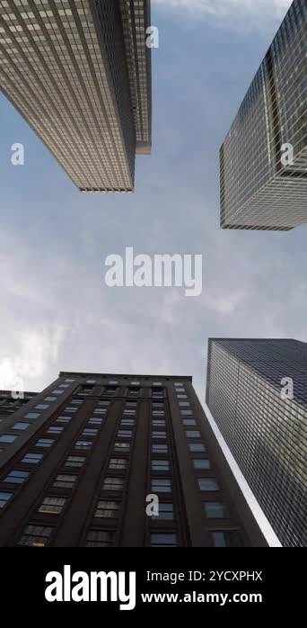 Experience a breathtaking view of skyscrapers soaring high against a ...