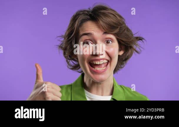 Stylish woman with hand sign like, thumbs up gesture. Happy lady ...