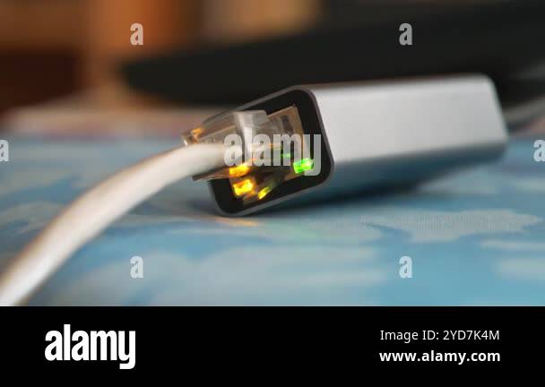 Ethernet cable adapter. Working ethernet cable adapter with green LED ...