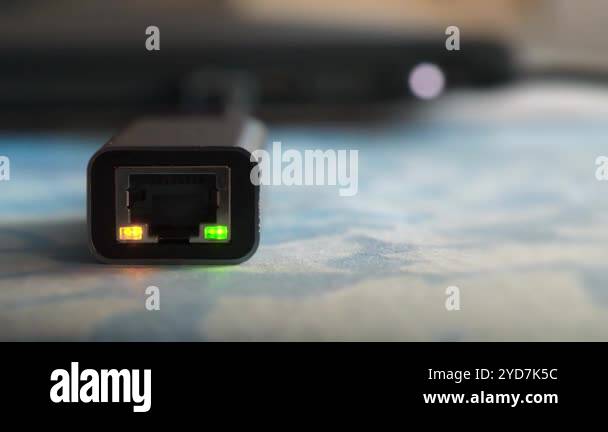 Ethernet cable adapter with green and yellow LED. Internet cable ...