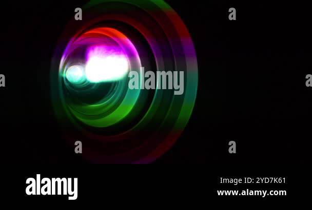 Projector lens in operation. Spectral decomposition of light ...
