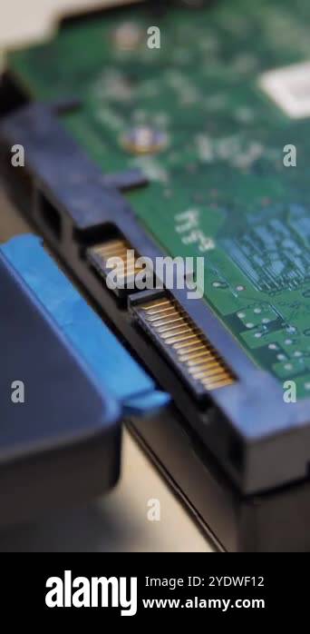 Close up of connecting a chip via an adapter to an external device ...