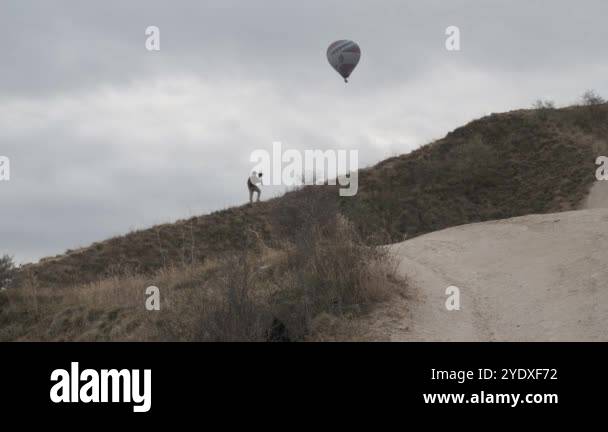 Man flying balloon Stock Videos & Footage - HD and 4K Video Clips - Alamy
