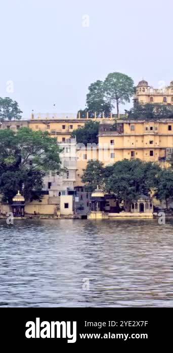 Udaipur Lal ghat and luxury Udaipur City Palace view over lake Pichola ...
