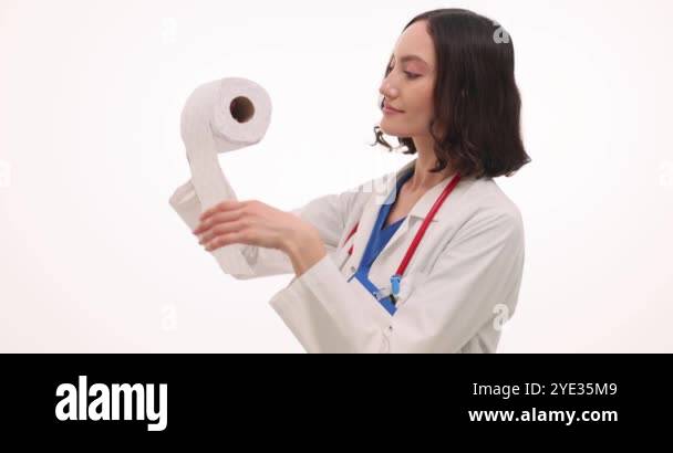Woman doctor in lab coat pulls toilet paper on roll. Brunette female ...
