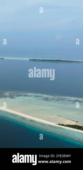 Top view of tropical islands on the atoll and coral reef. Timba Timba ...