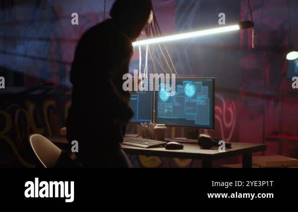 Hacker Arrives In Messy Base Of Operations With Neon Lights And
