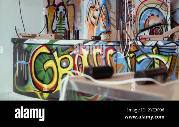 Empty pizza boxes and spray cans left over in dirty ghetto by urban ...