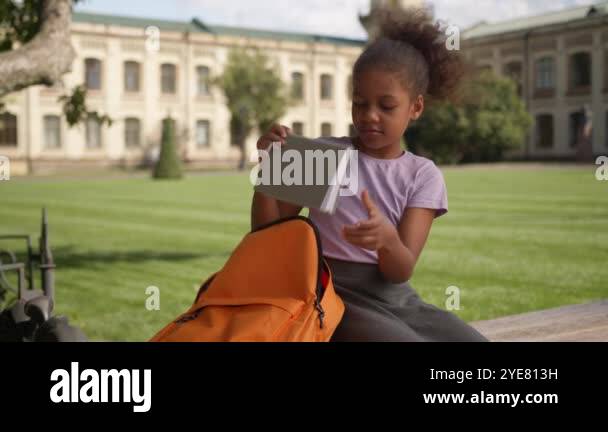 Child kid daughter African American little girl take copybook backpack ...