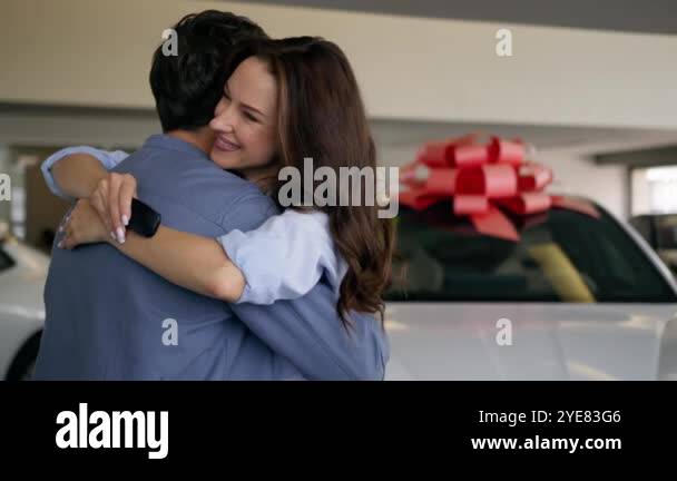 Caucasian couple family celebrate buying new luxury car smiling happy ...