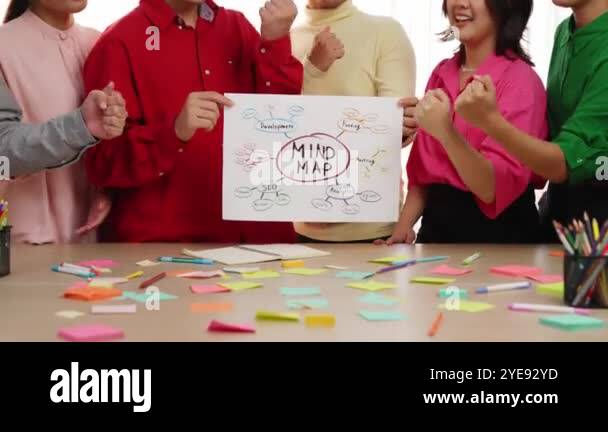 Slow motion successful happy and excited young businesspeople presents ...