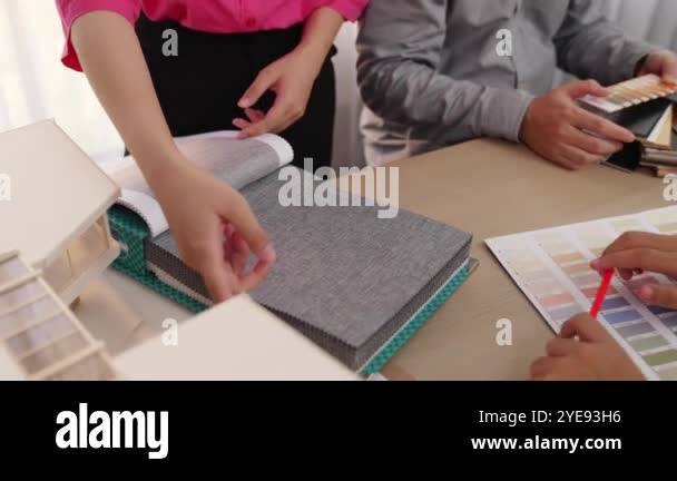 Slow motion home designer using architectural equipment draw a ...