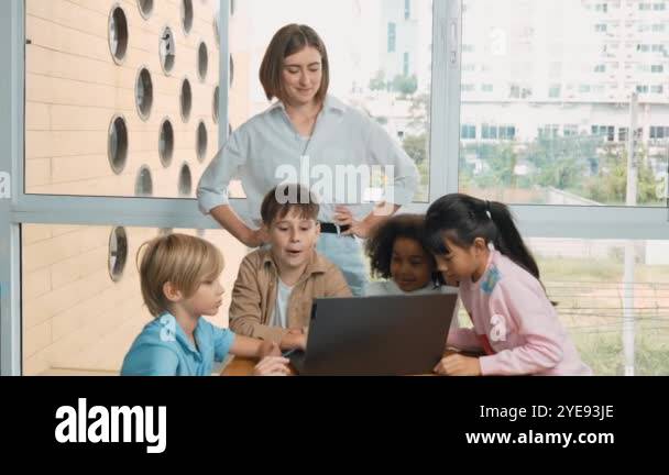 Cute african girl programing system while surround with caucasian ...