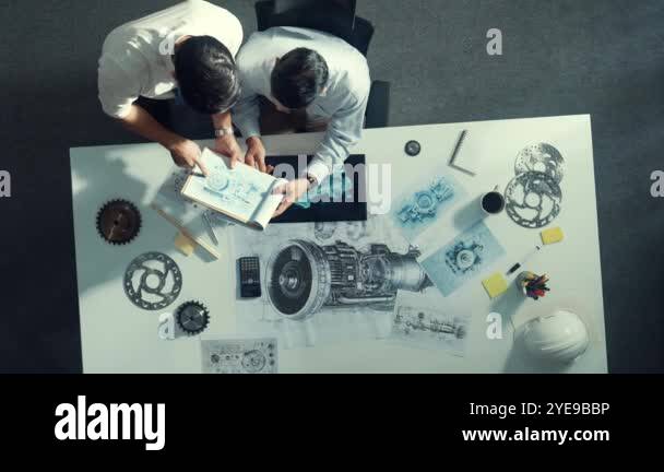 Top down aerial view of manager sitting while answer question about jet ...