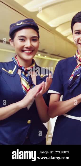 Cabin crew clapping hands in airplane . Airline transportation and ...