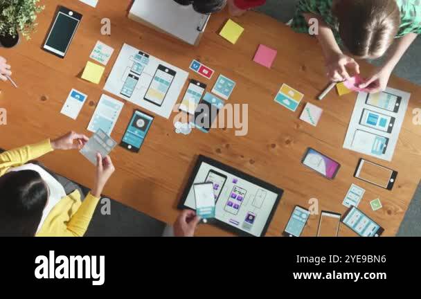 Top view of smart software developer planning software development. Skilled programmer team ...