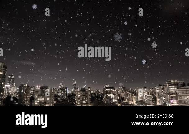 Snowflakes falling animation over city skyline at night. Winter ...