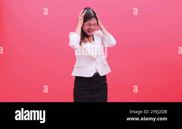 beautiful girl wearing white office suit dizzy candid head, both hands ...