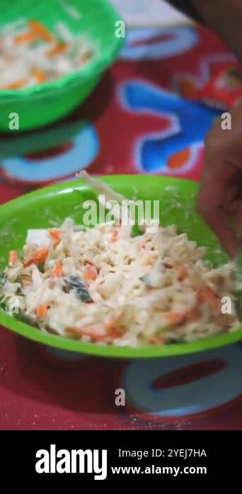 A mixture of cabbage and flour makes fried bala2, a typical Indonesian ...