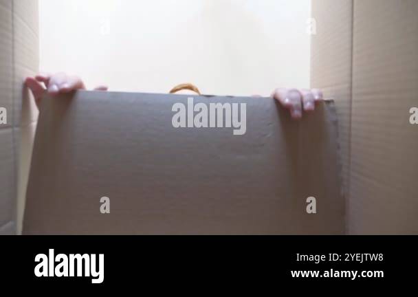 Child opening box with gift and pulling hands to take it. Little boy ...