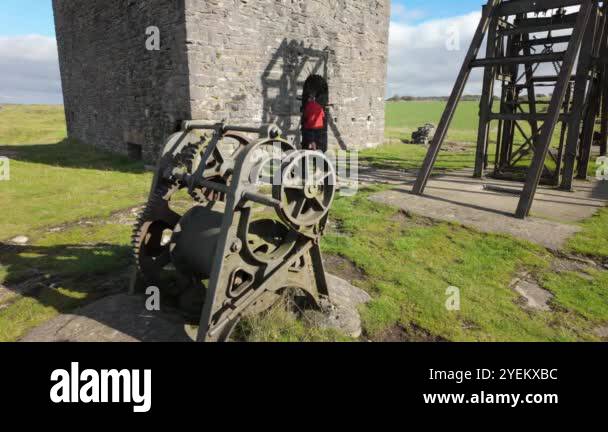 SHELDON, DERBYSHIRE, ENGLAND - OCTOBER 17 2024: Male tourist wearing a ...