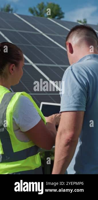 The engineer tells the customer how to use the solar panels. The power ...