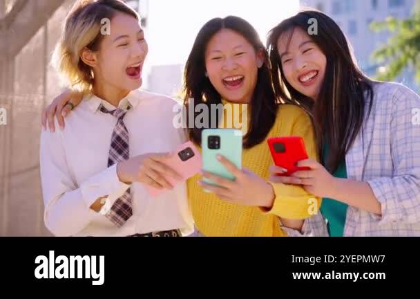 Chinese girls using smartphone Stock Videos & Footage - HD and 4K Video ...