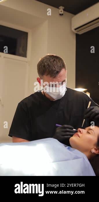 Examination of the skin of the face before plastic surgery. Plastic ...