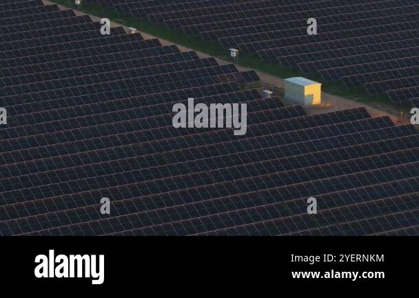 Rows of solar panels stretch across the landscape, showcasing a well ...