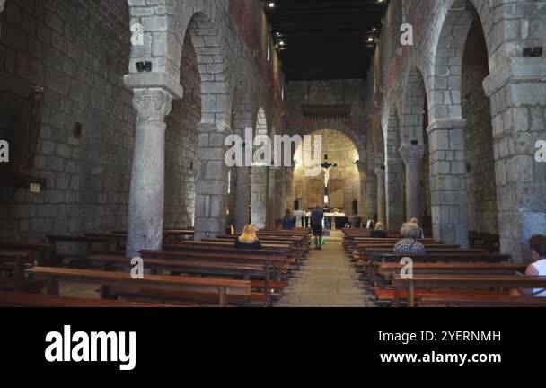 Explore the Romanesque architecture of a Sardinian church, featuring ...