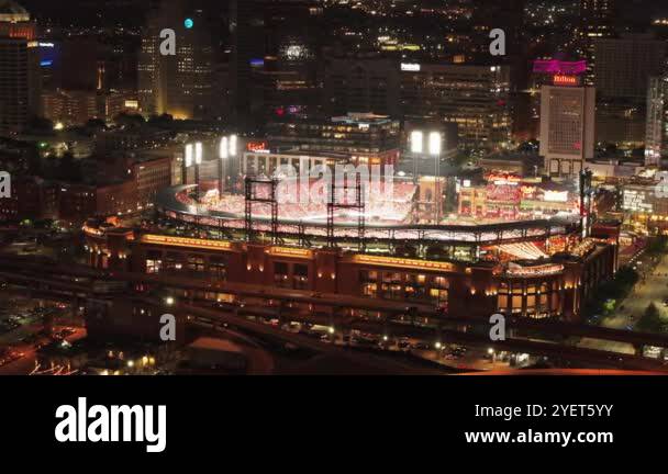 Lively energy of a baseball stadium in downtown St. Louis at night ...
