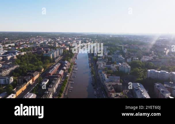 Sunlight brightens Turku city center, illuminating the Aura River as it ...