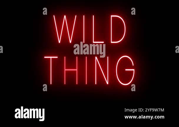 Flickering red retro style neon sign glowing against a black background ...