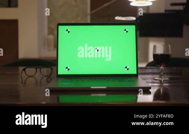 Laptop displaying green chroma key screen versatility of green screen ...