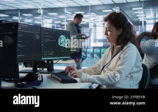 Developer listening music while programming in AI data center used for machine learning training ...